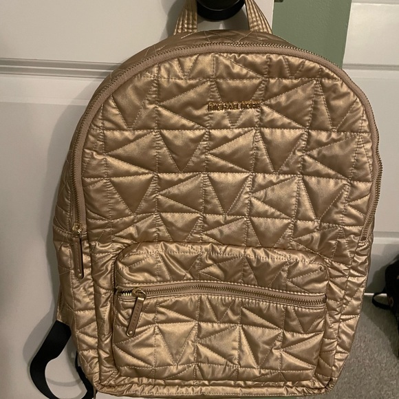 MICHAEL Michael Kors | Bags | Michael Kors Quilted Nylon Gold Backpack ...